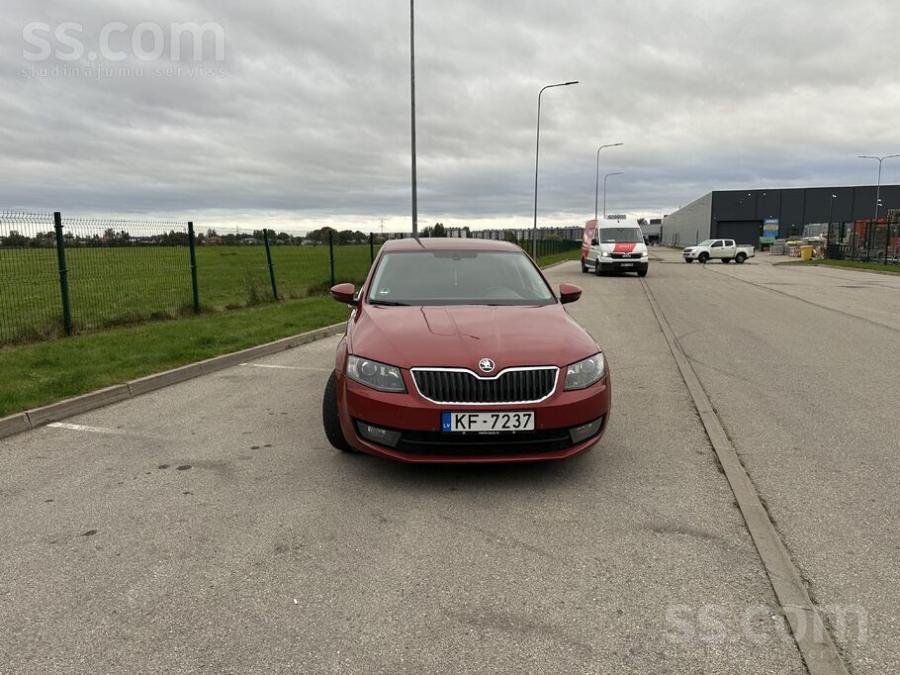 Red Skoda Octavia 2014 in Riga, with an engine capacity of 2.00 L and mileage of 248 thousand km for 5300 €, photo 6 on AUTOMOTO.COM.LV