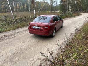 Red Skoda Octavia 2014 in Riga, with an engine capacity of 1.60 L and mileage of 305 thousand km for 3200 €, photo 3 on AUTOMOTO.COM.LV