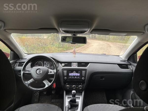 Red Skoda Octavia 2014 in Riga, with an engine capacity of 1.60 L and mileage of 305 thousand km for 3200 €, photo 4 on AUTOMOTO.COM.LV