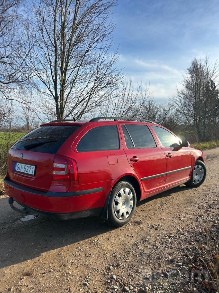 Red Skoda Octavia 2007 in Liepaja, with an engine capacity of 1.90 L and mileage of 209 thousand km for 1700 €, photo 5 on AUTOMOTO.COM.LV