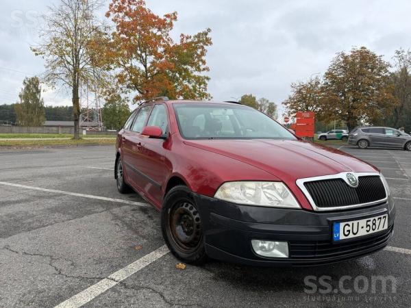 Red Skoda Octavia 2007 in Riga, with an engine capacity of 2.00 L and mileage of 212 thousand km for 1350 €, photo 3 on AUTOMOTO.COM.LV