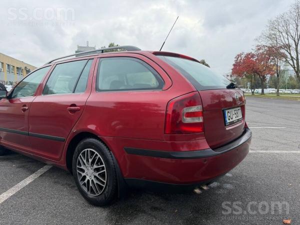Red Skoda Octavia 2007 in Riga, with an engine capacity of 2.00 L and mileage of 212 thousand km for 1350 €, photo 6 on AUTOMOTO.COM.LV