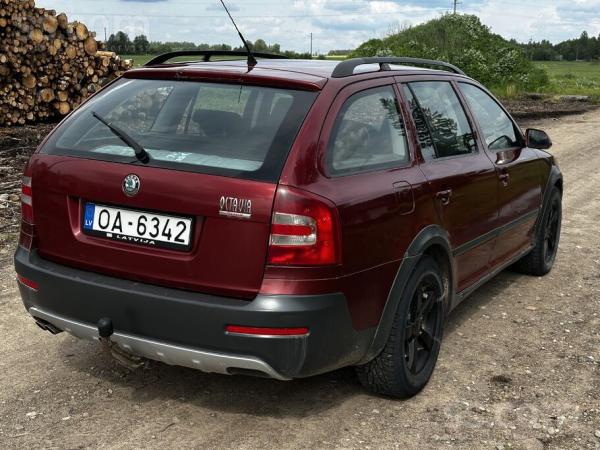 Red Skoda Octavia 2008 in Jekabpils, with an engine capacity of 2.00 L and mileage of 289 thousand km for 2200 €, photo 5 on AUTOMOTO.COM.LV