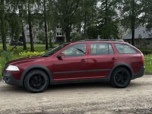 Red Skoda Octavia 2008 in Jekabpils, with an engine capacity of 2.00 L and mileage of 289 thousand km for 2200 €, photo 6 on AUTOMOTO.COM.LV