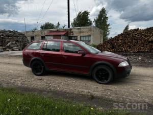 Red Skoda Octavia 2008 in Jekabpils, with an engine capacity of 2.00 L and mileage of 289 thousand km for 2200 €, photo 7 on AUTOMOTO.COM.LV