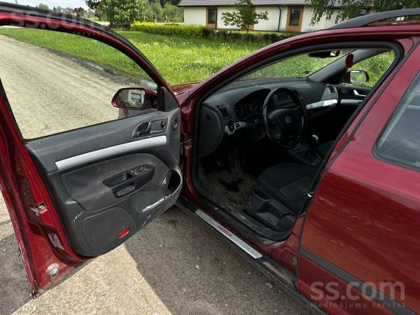 Red Skoda Octavia 2008 in Jekabpils, with an engine capacity of 2.00 L and mileage of 289 thousand km for 2200 €, photo 9 on AUTOMOTO.COM.LV