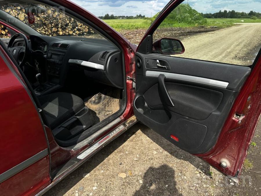 Red Skoda Octavia 2008 in Jekabpils, with an engine capacity of 2.00 L and mileage of 289 thousand km for 2200 €, photo 11 on AUTOMOTO.COM.LV
