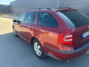 Sarkans Skoda Octavia 2008 Kauņa, ar dzinēja tilpumu 2.00 L un nobraukumu 407 tūkst. km par 1550 €, foto 11 vietnē AUTOMOTO.COM.LV