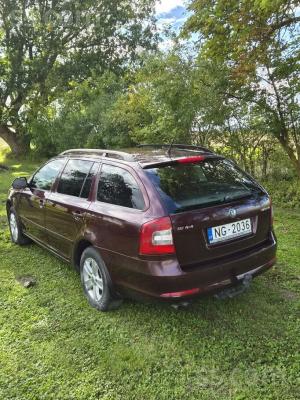 Sarkans Skoda Octavia 2012 Rīga, ar dzinēja tilpumu 2.00 L un nobraukumu 292 tūkst. km par 4200 €, foto 5 vietnē AUTOMOTO.COM.LV
