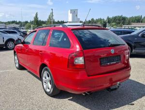 Red Skoda Octavia 2013 in Utena, with an engine capacity of 1.97 L and mileage of 345 thousand km for 4200 €, photo 5 on AUTOMOTO.COM.LV