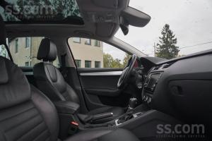 Red Skoda Octavia 2015 in Riga, with an engine capacity of 1.80 L and mileage of 209 thousand km for 8990 €, photo 8 on AUTOMOTO.COM.LV