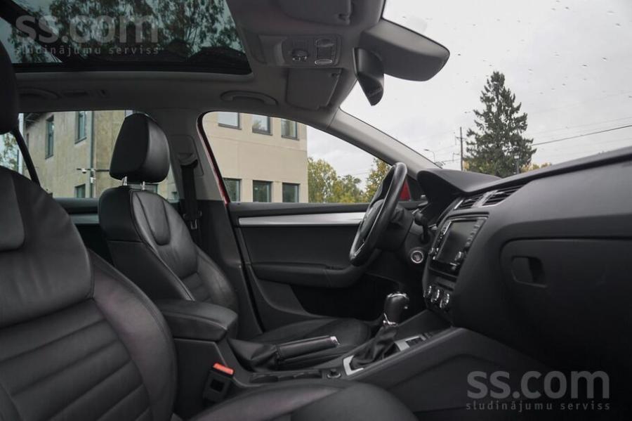 Red Skoda Octavia 2015 in Riga, with an engine capacity of 1.80 L and mileage of 209 thousand km for 8990 €, photo 8 on AUTOMOTO.COM.LV