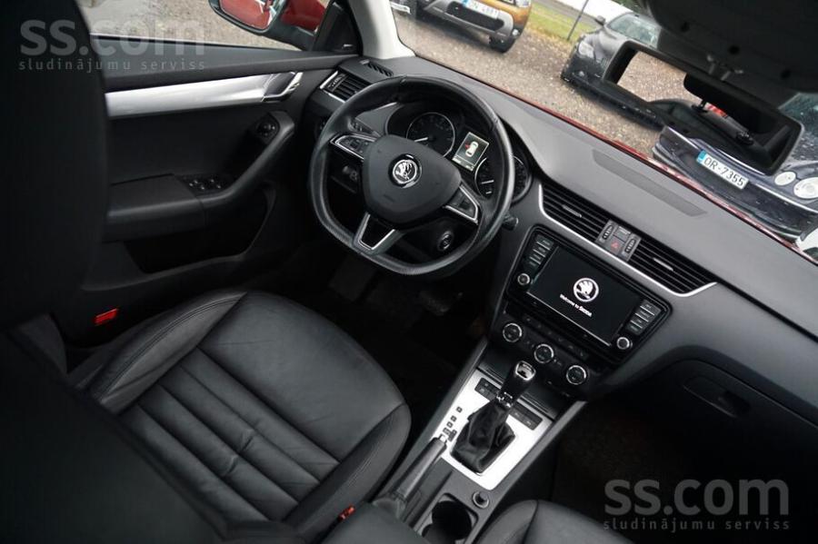 Red Skoda Octavia 2015 in Riga, with an engine capacity of 1.80 L and mileage of 209 thousand km for 8990 €, photo 12 on AUTOMOTO.COM.LV