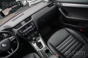 Red Skoda Octavia 2015 in Riga, with an engine capacity of 1.80 L and mileage of 209 thousand km for 8990 €, photo 14 on AUTOMOTO.COM.LV