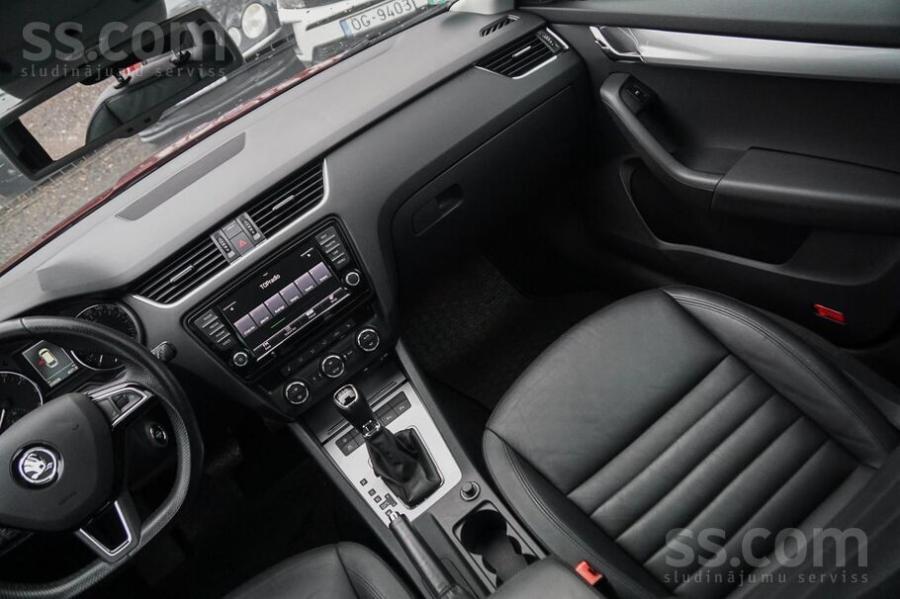 Red Skoda Octavia 2015 in Riga, with an engine capacity of 1.80 L and mileage of 209 thousand km for 8990 €, photo 14 on AUTOMOTO.COM.LV