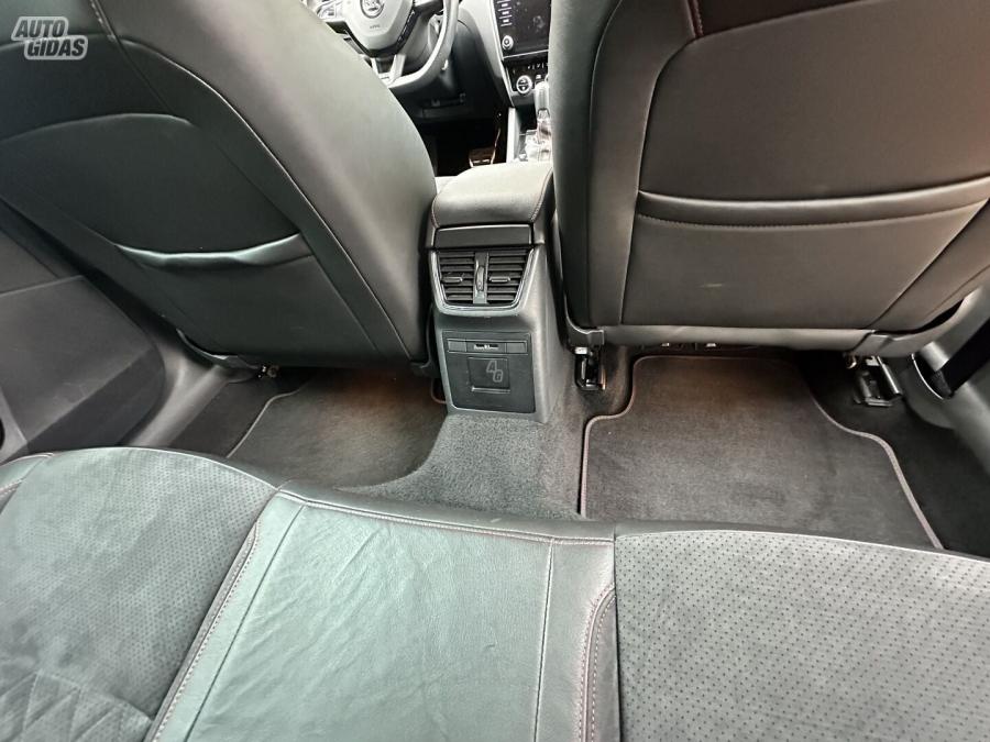Red Skoda Octavia 2018 in Taurage, with an engine capacity of 2.00 L and mileage of 185 thousand km for 15500 €, photo 12 on AUTOMOTO.COM.LV