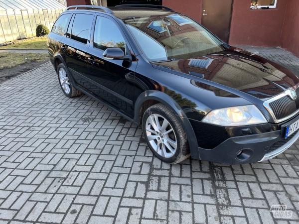 Black Skoda Octavia Scout 2008 in Siauliai, with an engine capacity of 2.00 L and mileage of 301 thousand km for 2950 €, photo 1 on AUTOMOTO.COM.LV