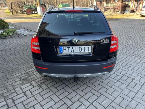 Black Skoda Octavia Scout 2008 in Siauliai, with an engine capacity of 2.00 L and mileage of 301 thousand km for 2950 €, photo 4 on AUTOMOTO.COM.LV