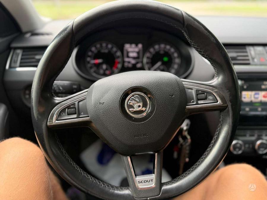 Blue Skoda Octavia Scout 2015 in Taurage, with an engine capacity of 2.00 L and mileage of 300 thousand km for 6900 €, photo 15 on AUTOMOTO.COM.LV