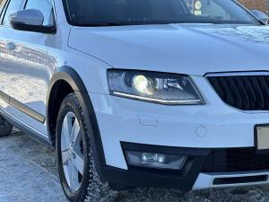 White Skoda Octavia Scout 2015 in Siauliai, with an engine capacity of 2.00 L and mileage of 230 thousand km for 7500 €, photo 14 on AUTOMOTO.COM.LV