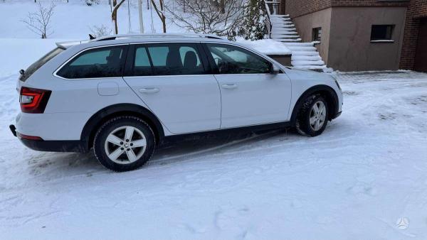 White Skoda Octavia Scout 2018 in Vilnius, with an engine capacity of 2.00 L and mileage of 293 thousand km for 12200 €, photo 5 on AUTOMOTO.COM.LV