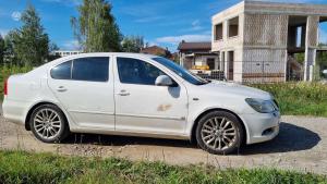 White Skoda Octavia 2009 in Vilnius, with an engine capacity of 1.80 L and mileage of 229 thousand km for 1500 €, photo 4 on AUTOMOTO.COM.LV