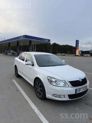 Белый Шкода Октавия 2011 в Рига, объемом двигателя 1.60 л и пробегом 449 тыс. км за 4000 €, фото 5 на AUTOMOTO.COM.LV