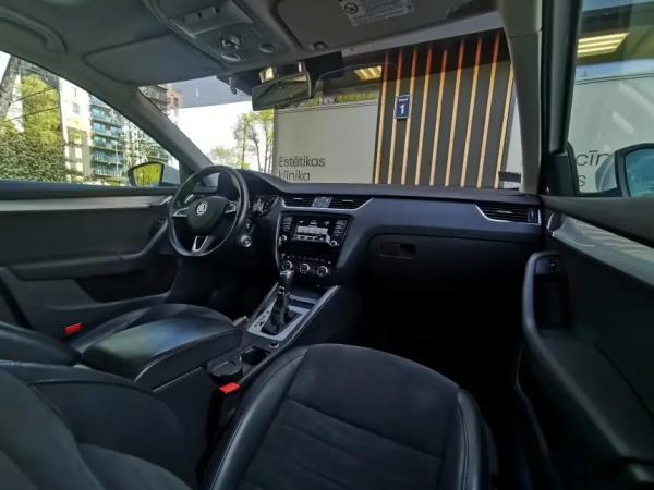 White Skoda Octavia 2013 in Riga, with an engine capacity of 2.00 L and mileage of 225 thousand km for 9490 €, photo 8 on AUTOMOTO.COM.LV