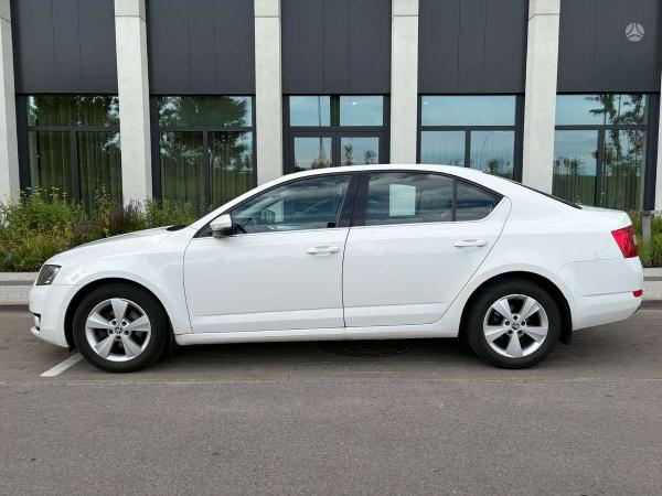 White Skoda Octavia 2013 in Vilnius, with an engine capacity of 1.40 L and mileage of 241 thousand km for 4900 €, photo 1 on AUTOMOTO.COM.LV