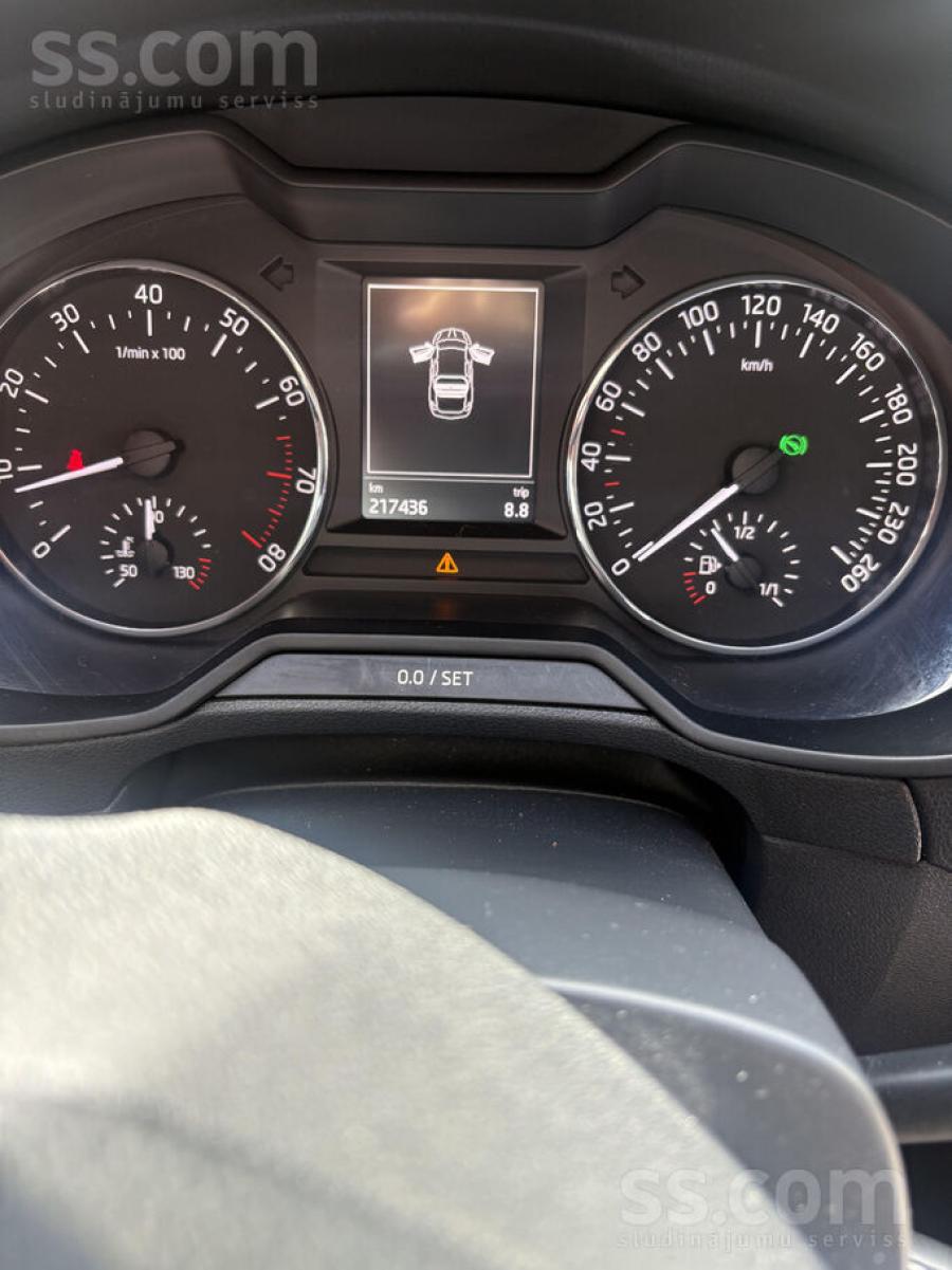 White Skoda Octavia 2013 in Riga, with an engine capacity of 1.80 L and mileage of 217 thousand km for 7950 €, photo 11 on AUTOMOTO.COM.LV
