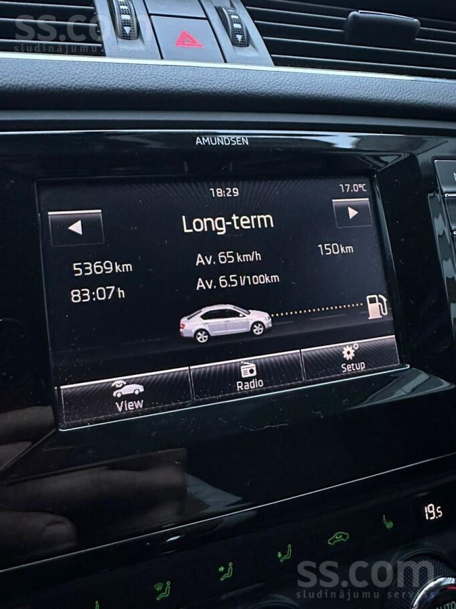 White Skoda Octavia 2013 in Riga, with an engine capacity of 1.80 L and mileage of 218 thousand km for 7950 €, photo 11 on AUTOMOTO.COM.LV