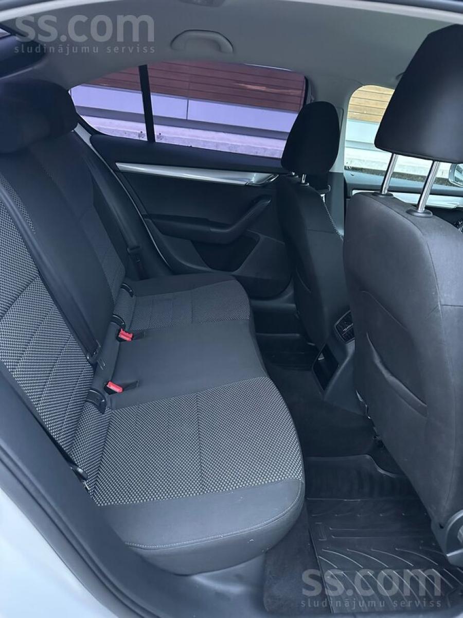 White Skoda Octavia 2013 in Riga, with an engine capacity of 1.80 L and mileage of 218 thousand km for 7950 €, photo 18 on AUTOMOTO.COM.LV