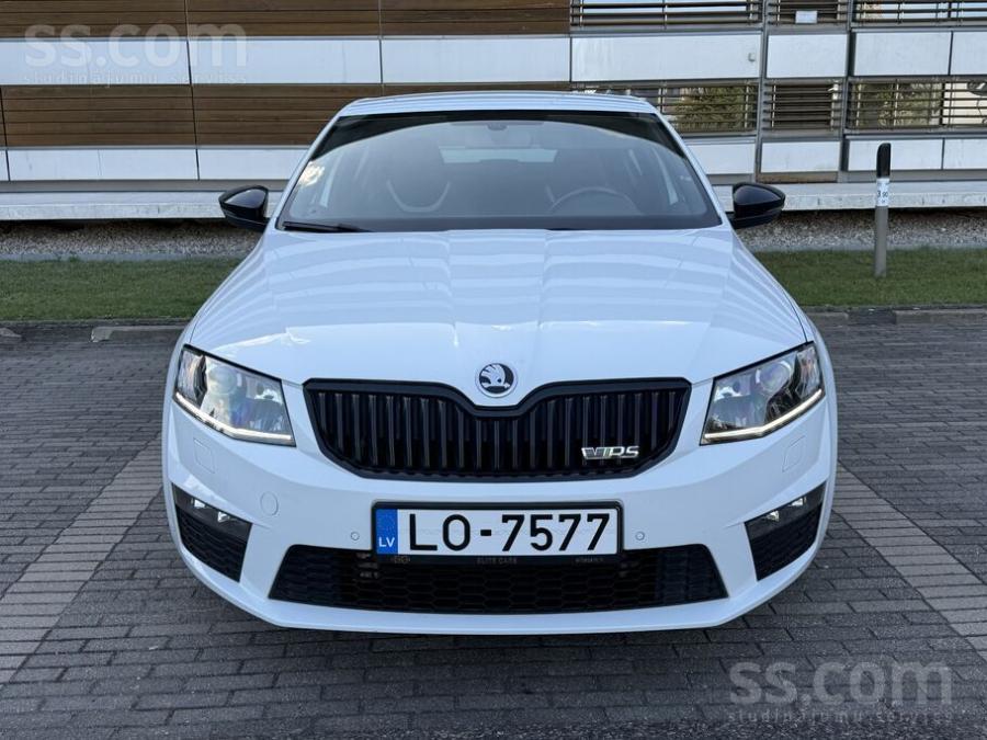 White Skoda Octavia 2014 in Riga, with an engine capacity of 2.00 L and mileage of 195 thousand km for 8900 €, photo 3 on AUTOMOTO.COM.LV