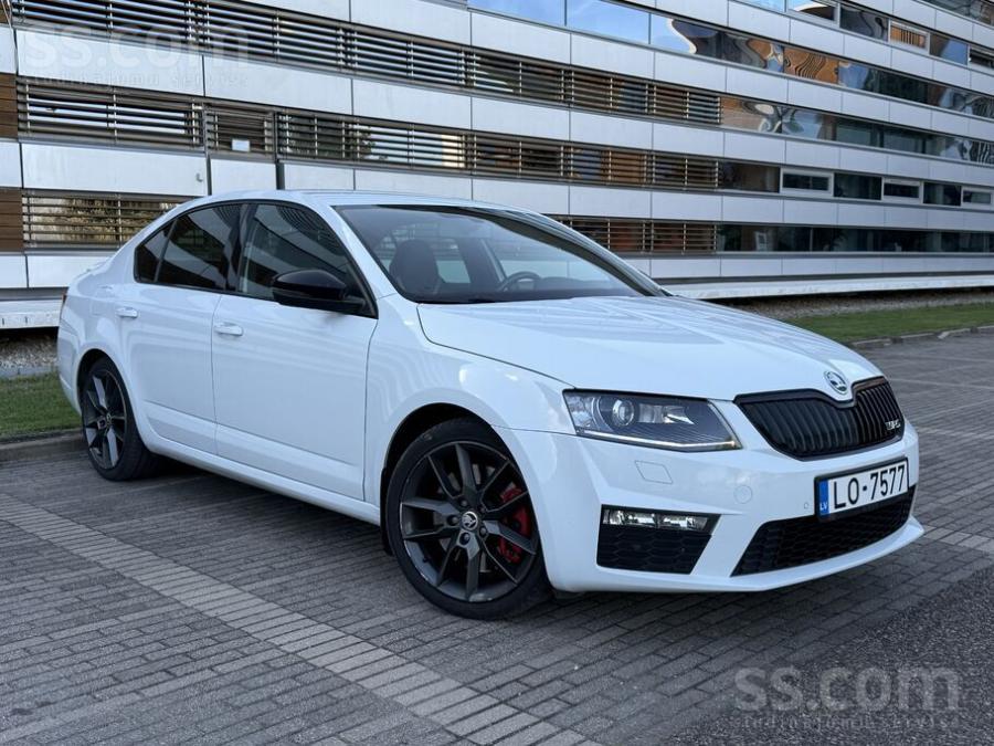 White Skoda Octavia 2014 in Riga, with an engine capacity of 2.00 L and mileage of 195 thousand km for 8900 €, photo 4 on AUTOMOTO.COM.LV