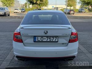 White Skoda Octavia 2014 in Riga, with an engine capacity of 2.00 L and mileage of 195 thousand km for 8900 €, photo 6 on AUTOMOTO.COM.LV