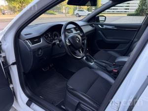 White Skoda Octavia 2014 in Riga, with an engine capacity of 2.00 L and mileage of 195 thousand km for 8900 €, photo 8 on AUTOMOTO.COM.LV