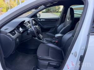 White Skoda Octavia 2014 in Riga, with an engine capacity of 2.00 L and mileage of 195 thousand km for 8900 €, photo 9 on AUTOMOTO.COM.LV