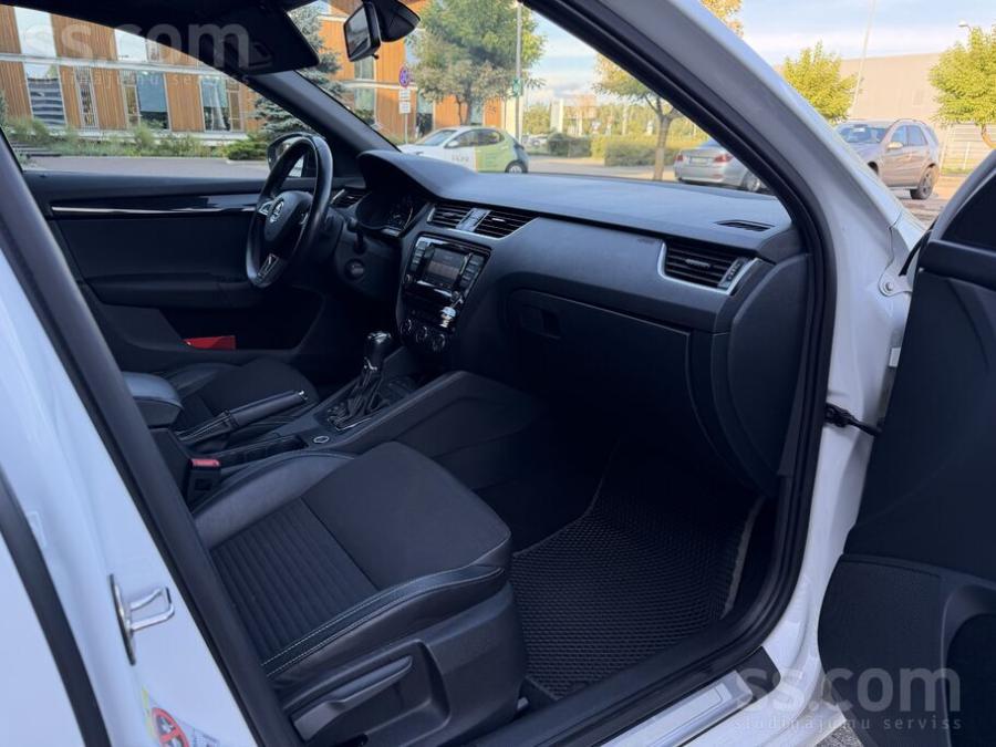 White Skoda Octavia 2014 in Riga, with an engine capacity of 2.00 L and mileage of 195 thousand km for 8900 €, photo 11 on AUTOMOTO.COM.LV