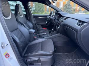 White Skoda Octavia 2014 in Riga, with an engine capacity of 2.00 L and mileage of 195 thousand km for 8900 €, photo 12 on AUTOMOTO.COM.LV
