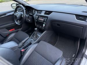 White Skoda Octavia 2014 in Riga, with an engine capacity of 2.00 L and mileage of 195 thousand km for 8900 €, photo 13 on AUTOMOTO.COM.LV