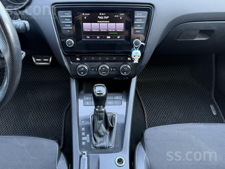 White Skoda Octavia 2014 in Riga, with an engine capacity of 2.00 L and mileage of 195 thousand km for 8900 €, photo 16 on AUTOMOTO.COM.LV