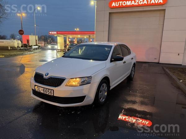 White Skoda Octavia 2015 in Riga, with an engine capacity of 1.60 L and mileage of 270 thousand km for 6600 €, photo 1 on AUTOMOTO.COM.LV