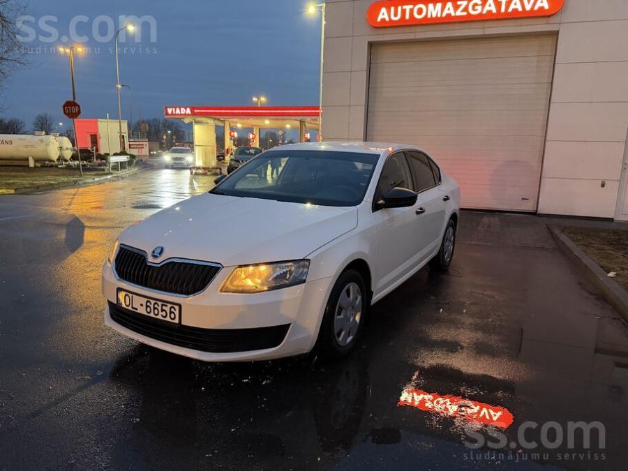 White Skoda Octavia 2015 in Riga, with an engine capacity of 1.60 L and mileage of 270 thousand km for 6600 €, photo 1 on AUTOMOTO.COM.LV