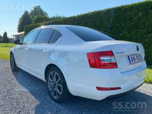 White Skoda Octavia 2015 in Riga, with an engine capacity of 2.00 L and mileage of 227 thousand km for 7800 €, photo 6 on AUTOMOTO.COM.LV