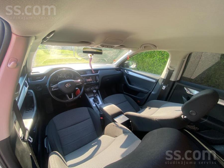 White Skoda Octavia 2015 in Riga, with an engine capacity of 2.00 L and mileage of 227 thousand km for 7800 €, photo 11 on AUTOMOTO.COM.LV