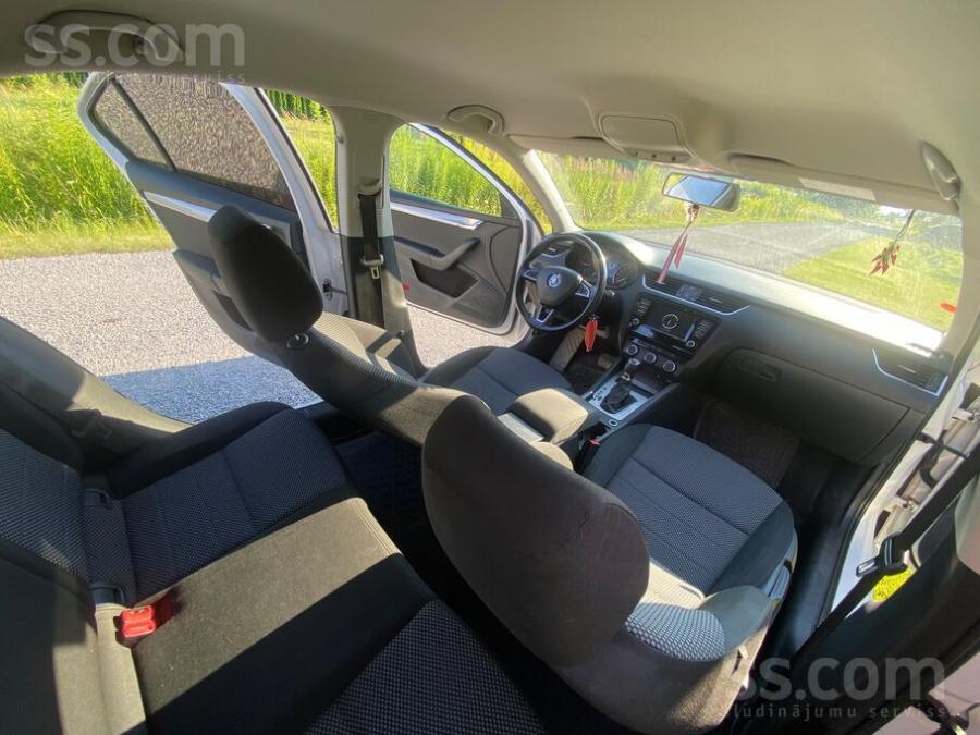 White Skoda Octavia 2015 in Riga, with an engine capacity of 2.00 L and mileage of 227 thousand km for 7800 €, photo 12 on AUTOMOTO.COM.LV