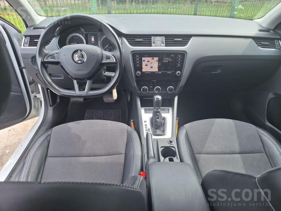 White Skoda Octavia 2018 in Riga, with an engine capacity of 1.60 L and mileage of 244 thousand km for 9250 €, photo 9 on AUTOMOTO.COM.LV