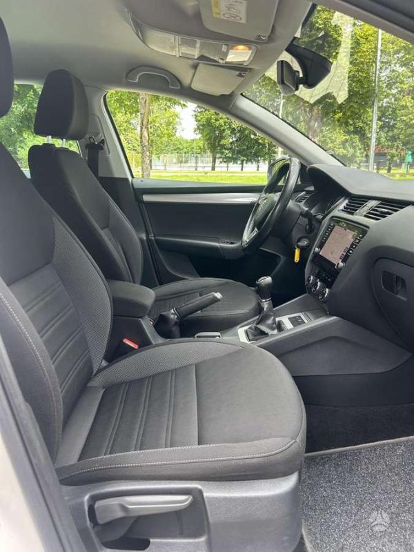White Skoda Octavia 2020 in Taurage, with an engine capacity of 1.97 L and mileage of 217 thousand km for 7400 €, photo 7 on AUTOMOTO.COM.LV