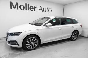 White Skoda Octavia 2022 in Vilnius, with an engine capacity of 1.40 L and mileage of 137 thousand km for 17950 €, photo 3 on AUTOMOTO.COM.LV
