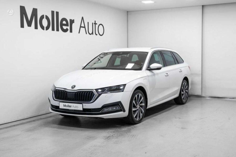 White Skoda Octavia 2022 in Vilnius, with an engine capacity of 1.40 L and mileage of 137 thousand km for 17950 €, photo 1 on AUTOMOTO.COM.LV